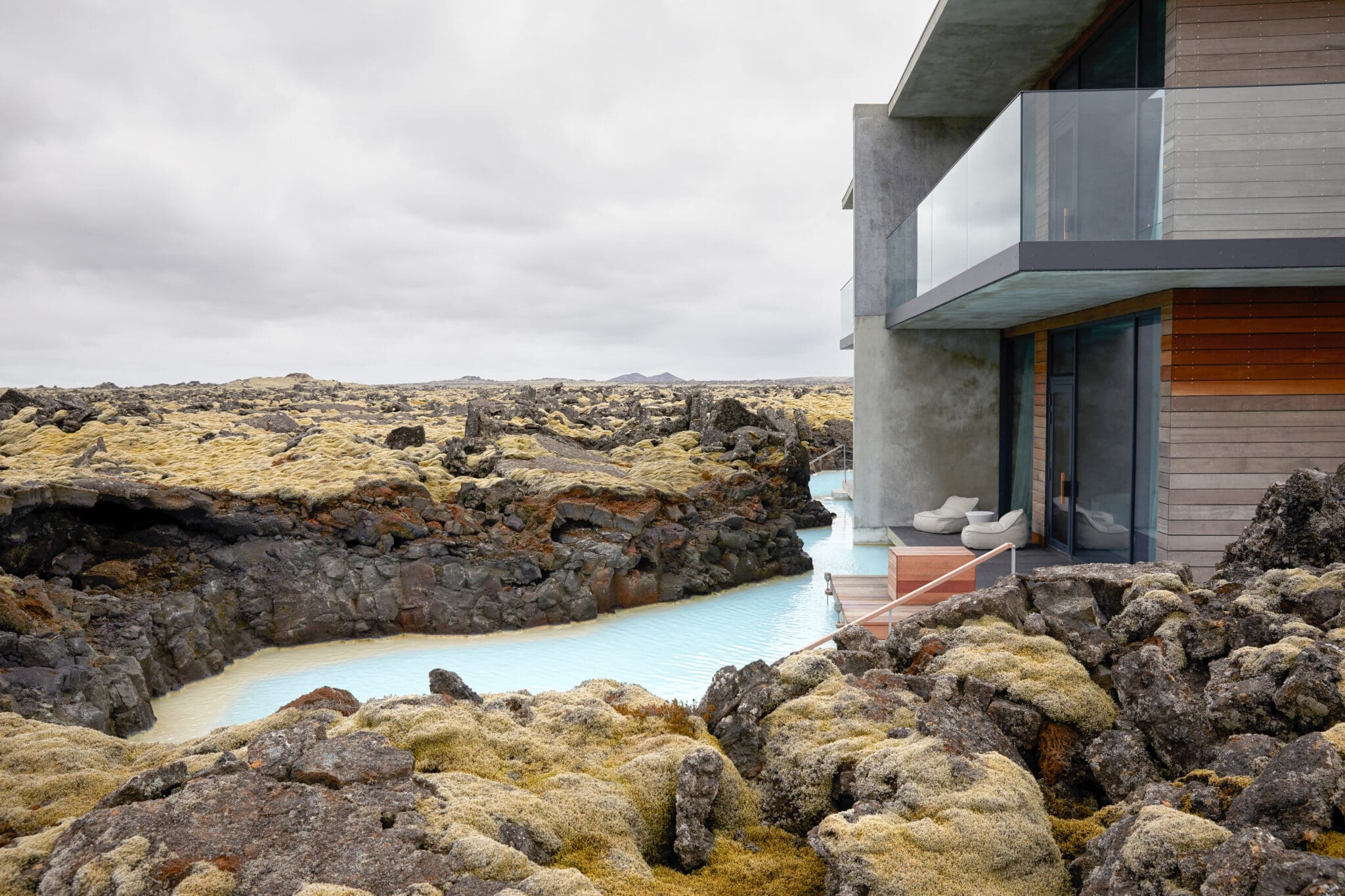 Glass relaxes in geothermal baths at The Retreat at Blue Lagoon in ...
