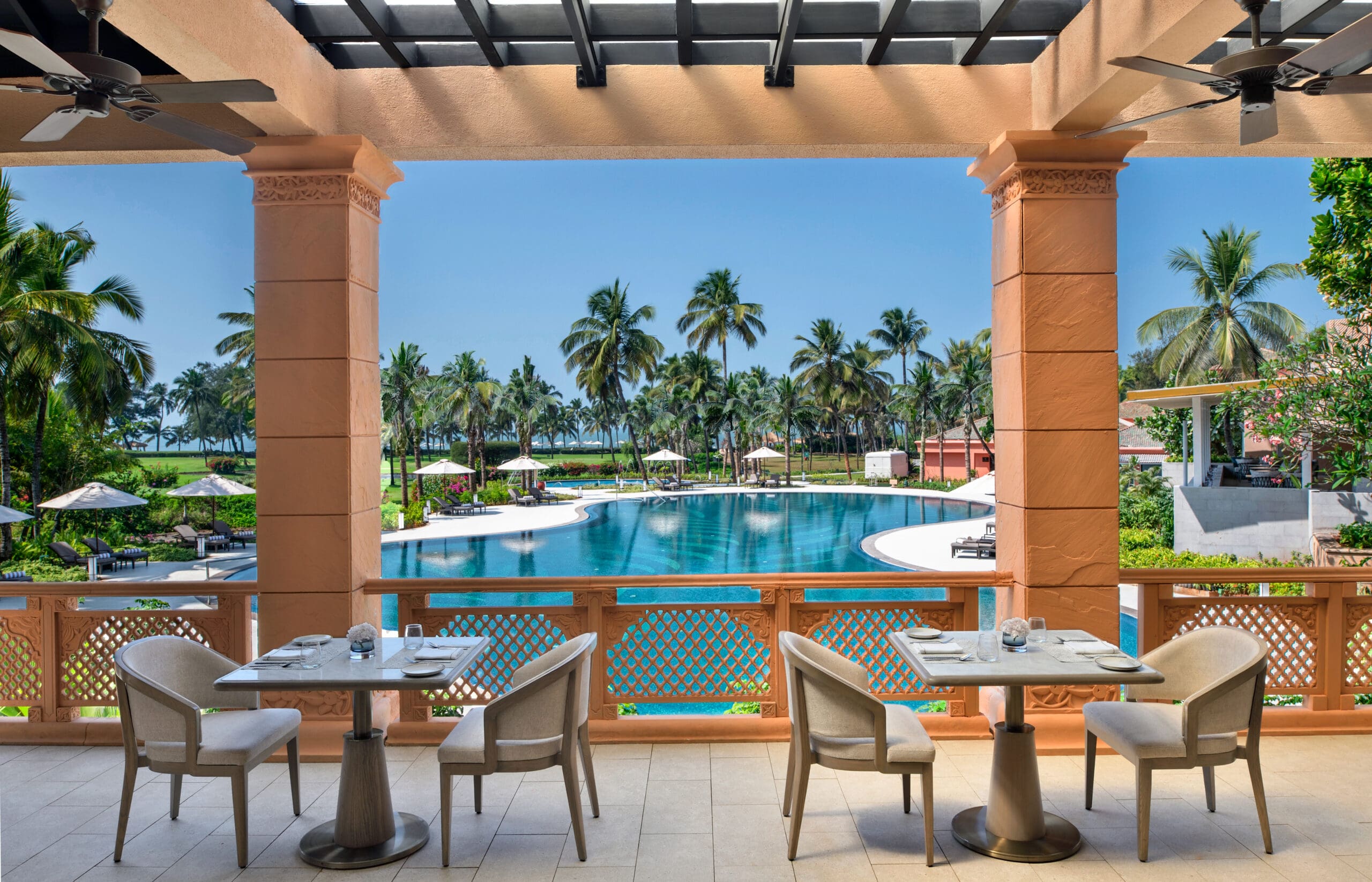 Glass takes in the sunrise to sunset at The St. Regis Goa Resort - The ...